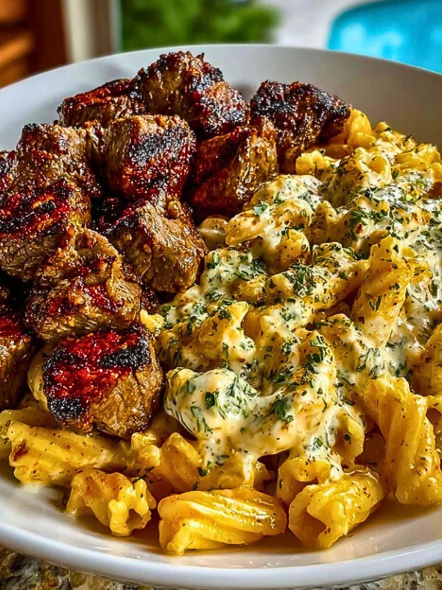 Cajun Steak Tips in Cheesy Penne Parmesan Sauce