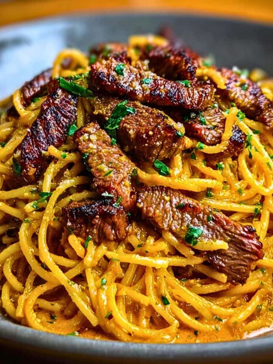 Creamy Cajun Garlic Butter Spaghetti with Beef Strips